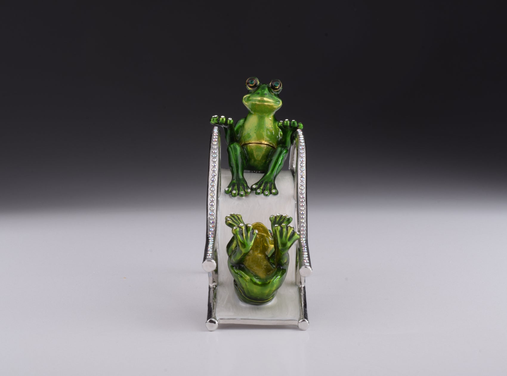 Two Frogs Riding Slide