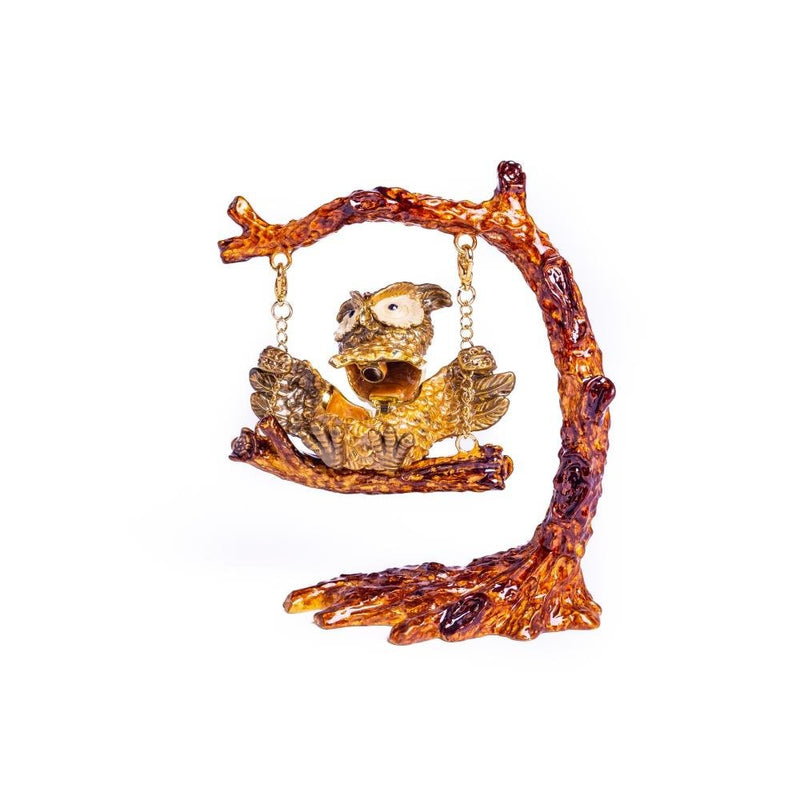 Owl Swinging on a Tree Branch